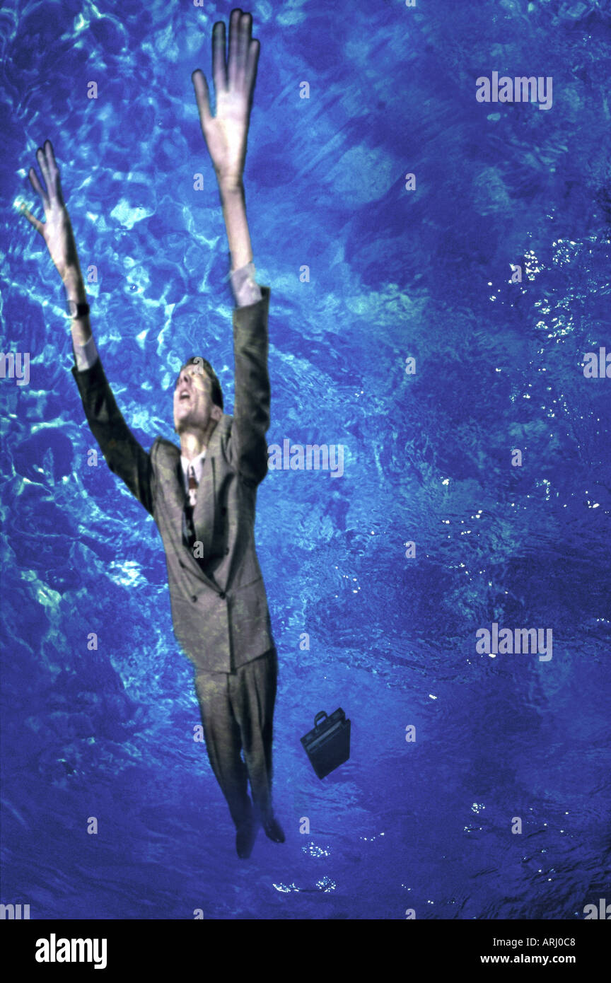 Drowning executive hi-res stock photography and images - Alamy