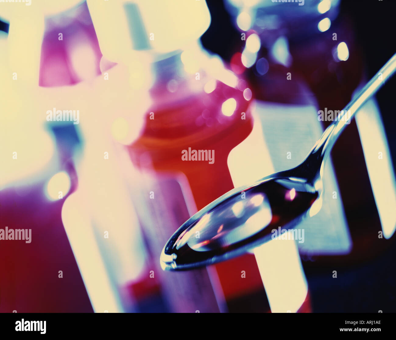 Tilted spoon hi-res stock photography and images - Alamy