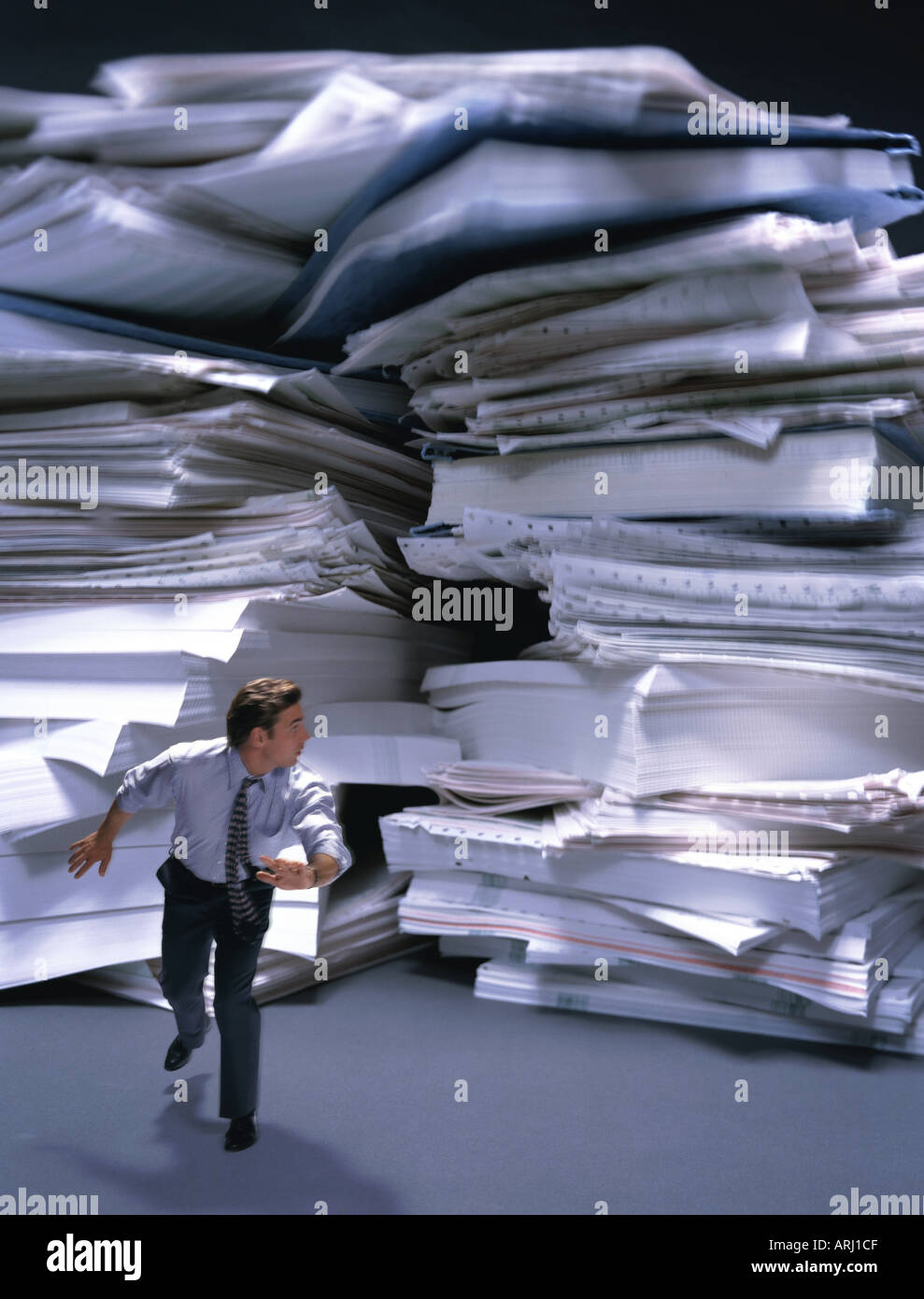 Man with chaotic desk hi-res stock photography and images - Alamy