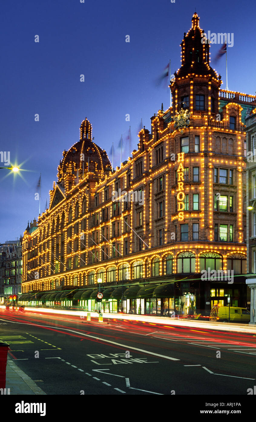 The famous Harrods department store lit up at dusk in Knightsbridge ...