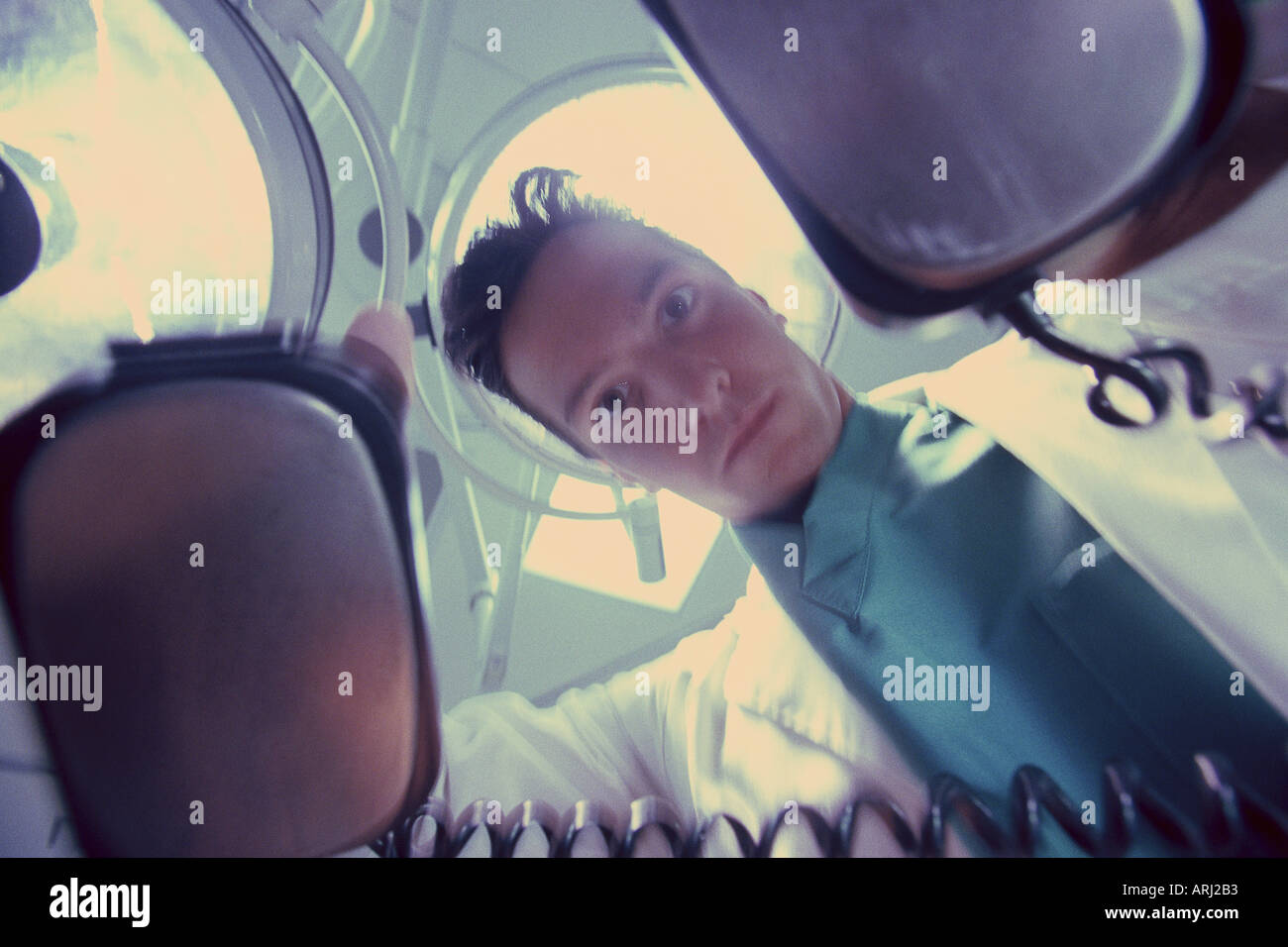 Doctor with Defibrillator Paddles Stock Photo - Alamy