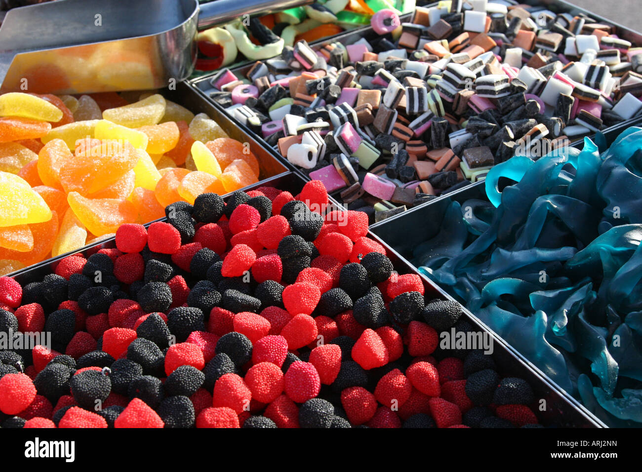 colourful sweets at a local market Stock Photo - Alamy