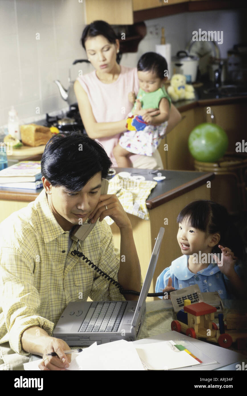 Multitasking parents hi-res stock photography and images - Alamy