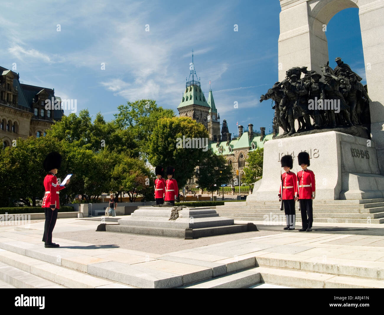 The changing of the guard at the War Memorial in Confederation Square ...