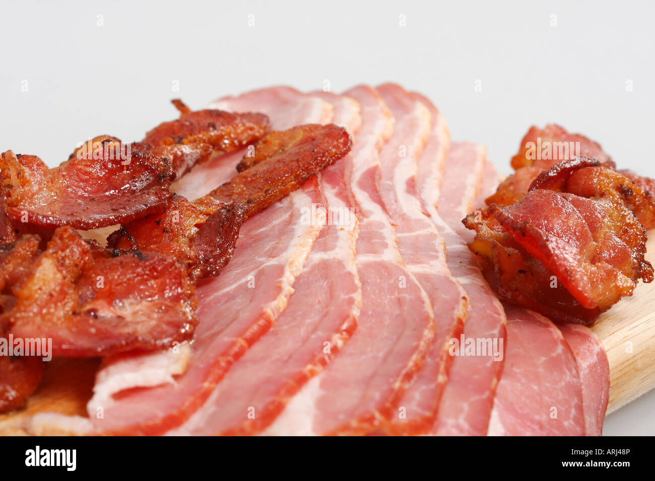 Bacon raw with crispy strips pork bacon meat fat food photo of a back ...