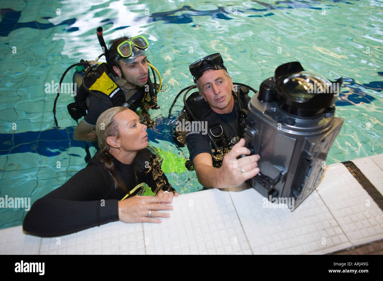 A wildlife cameraman teaches underwater filming techniques at a seminar ...