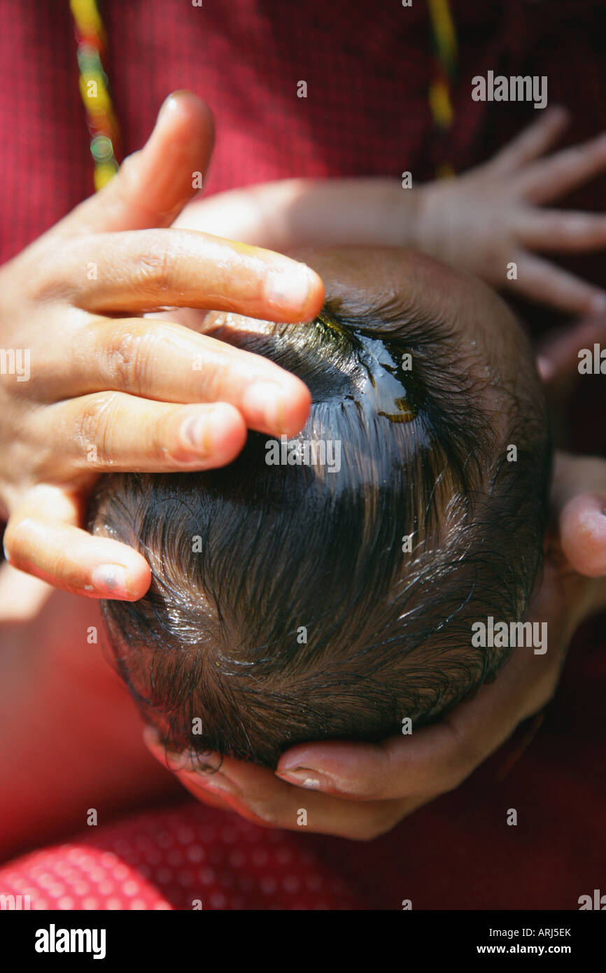 "Mother and baby Nepal Stock Photo - Alamy