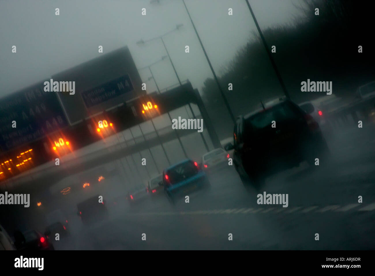 motorway traffic in heavy rain Stock Photo - Alamy