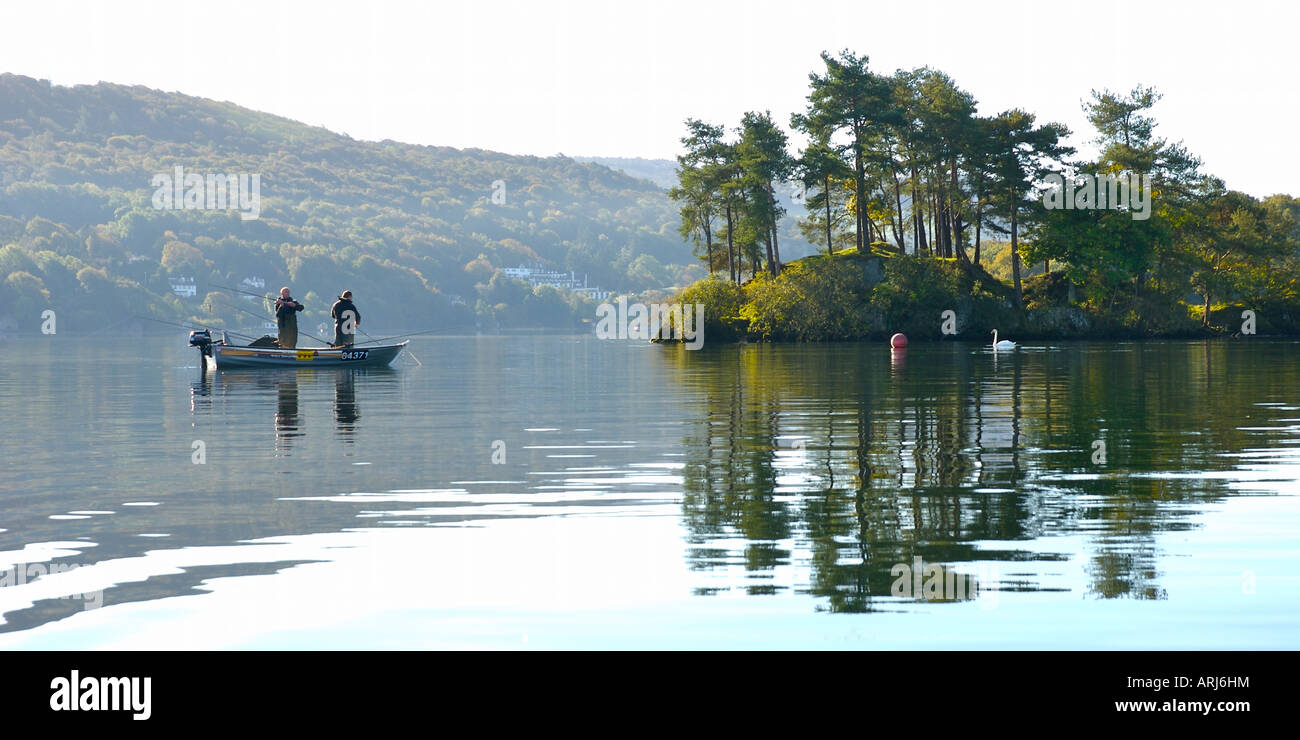 Fishing from a boat near Ling Holme, Lake Windermere, Lake District ...
