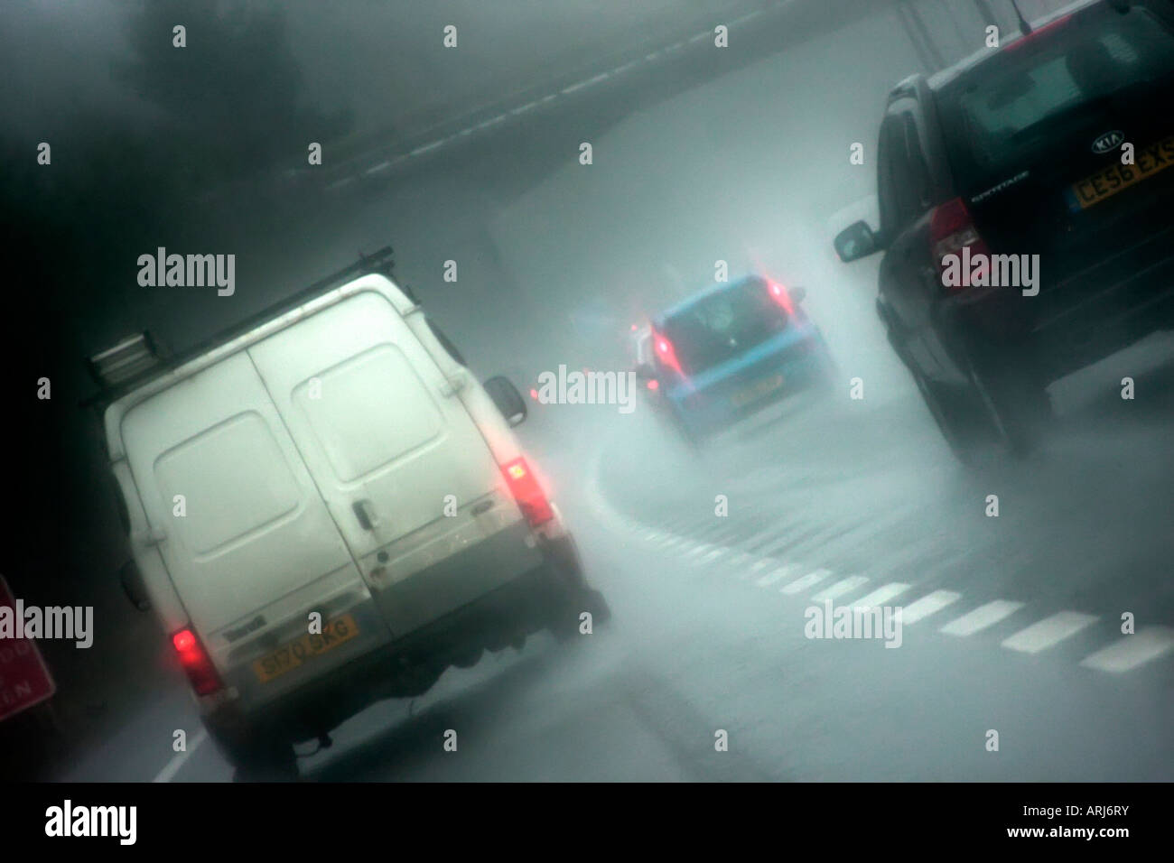 motorway traffic in heavy rain Stock Photo - Alamy