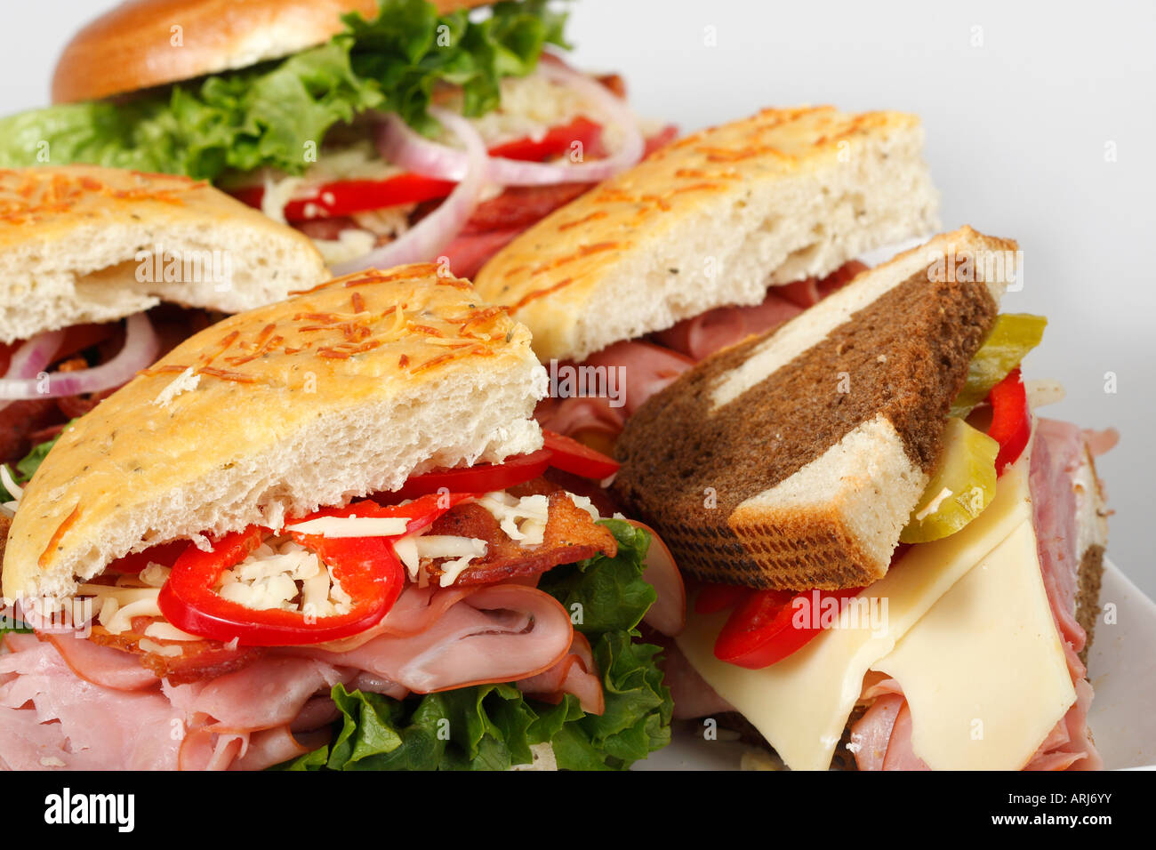 Platter of filled sandwiches on white background vegetables Focaccia ...