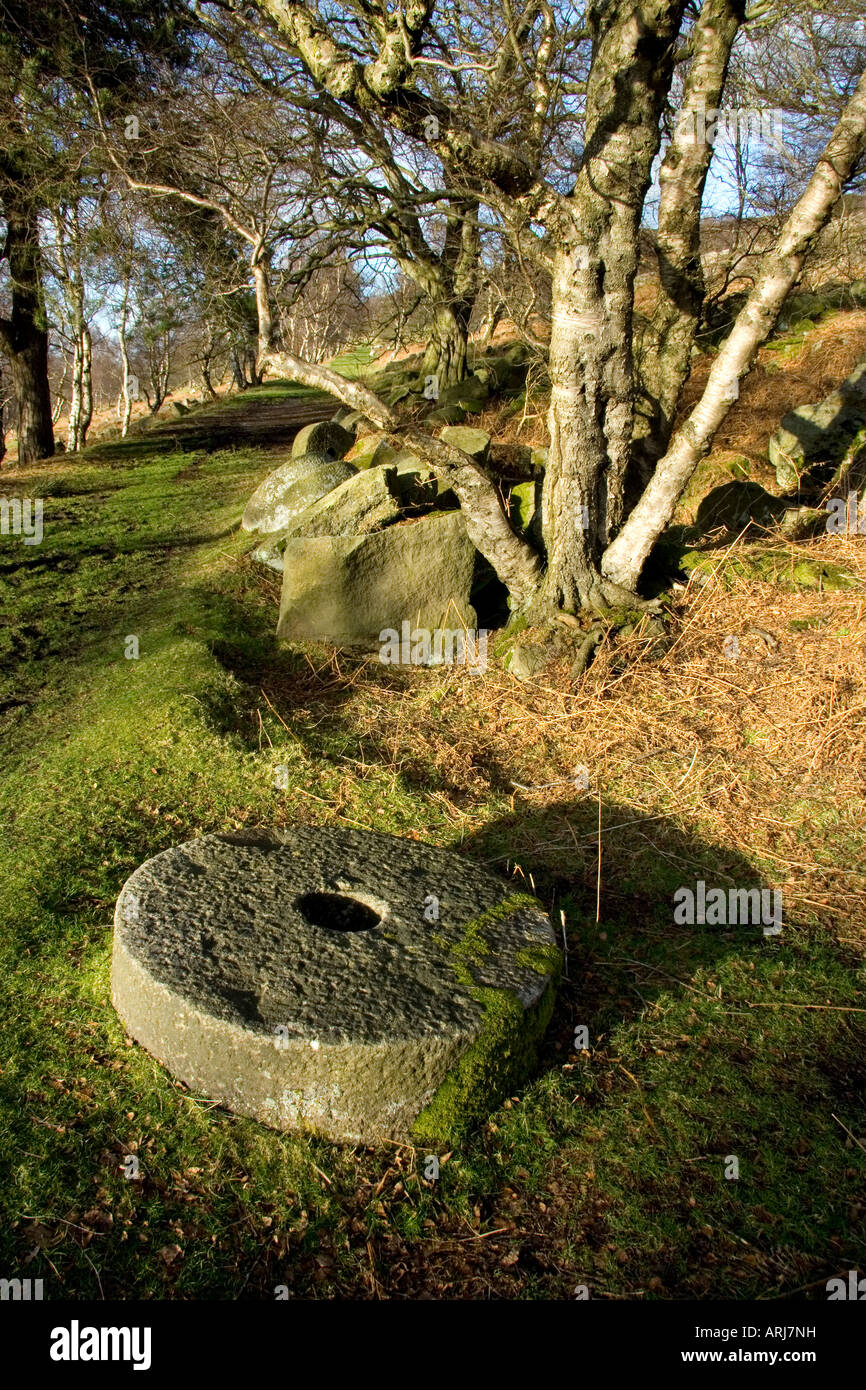 Abandoned millstone at Bole Hill Quarry near Hathersage, in the peak ...