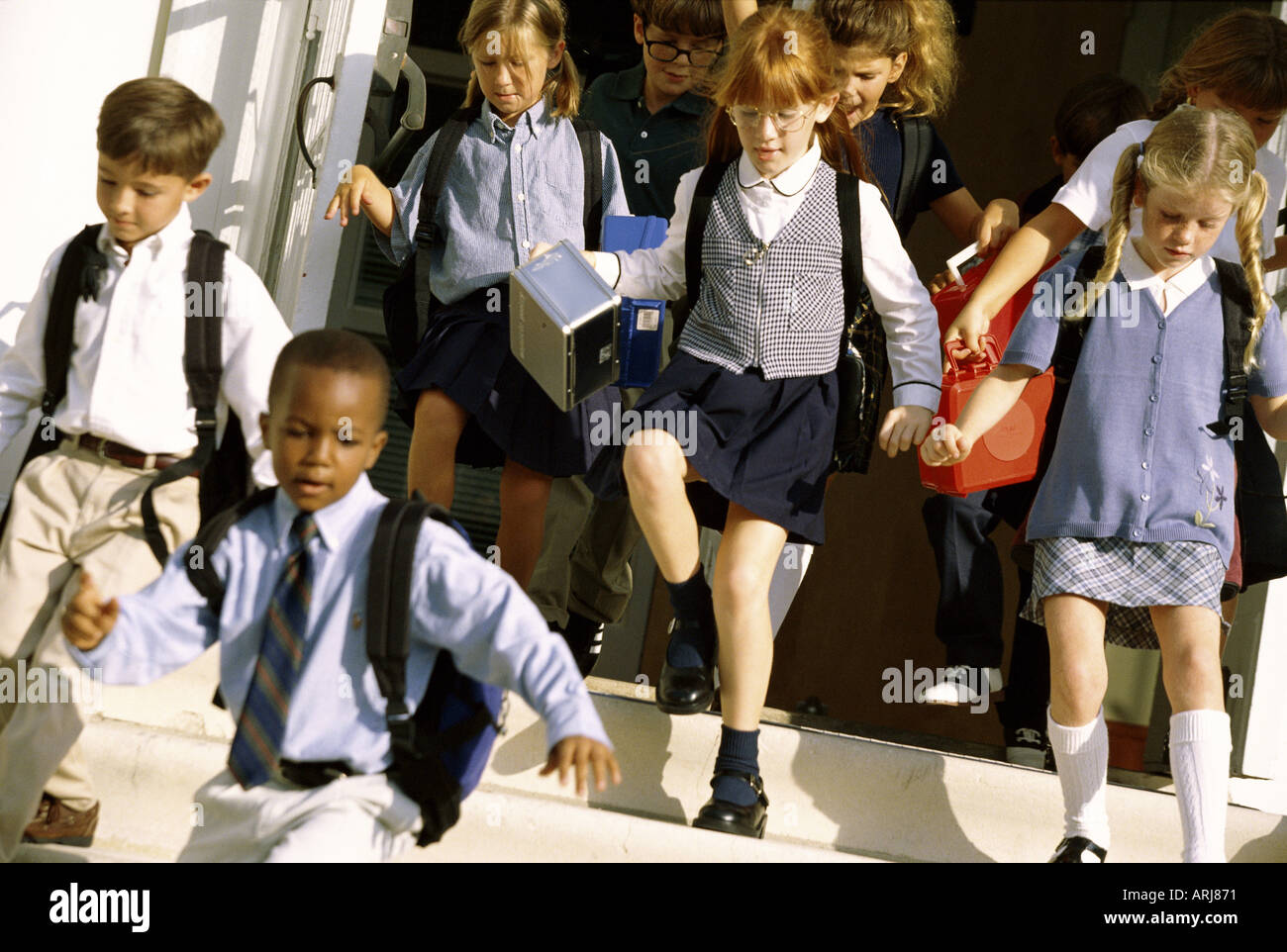 Kids leaving school hi-res stock photography and images - Alamy