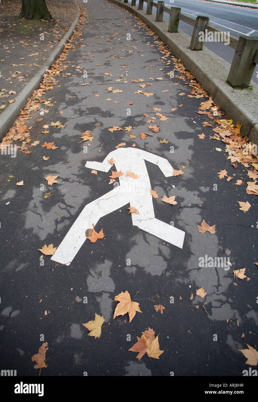 Pedestrian crossing sign in Park on trail Stock Photo - Alamy