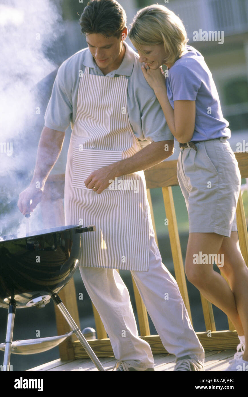 Young adult couples grill hi-res stock photography and images - Alamy