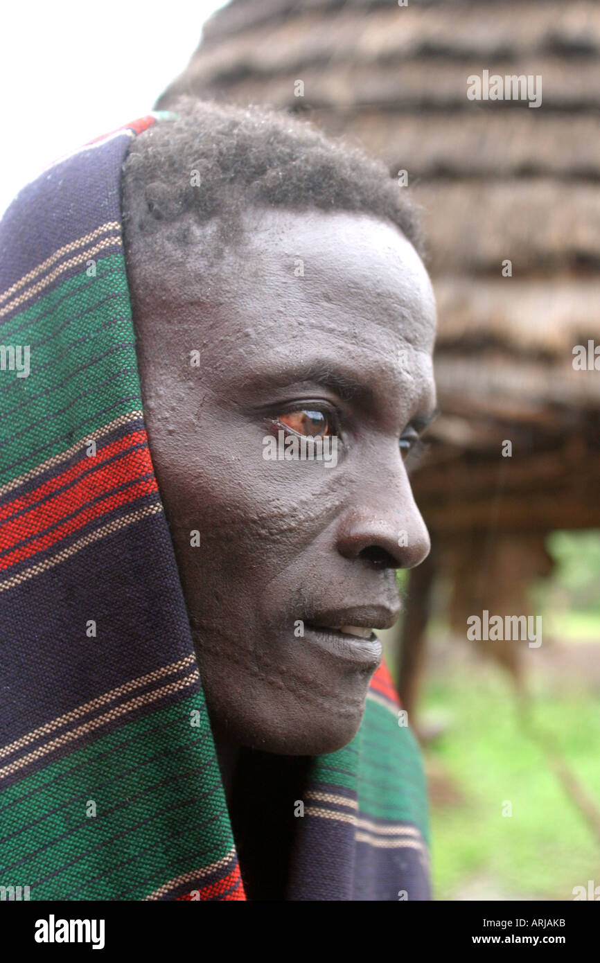 Toposa man with scarf as rain protection, portrait, Sudan Stock Photo ...