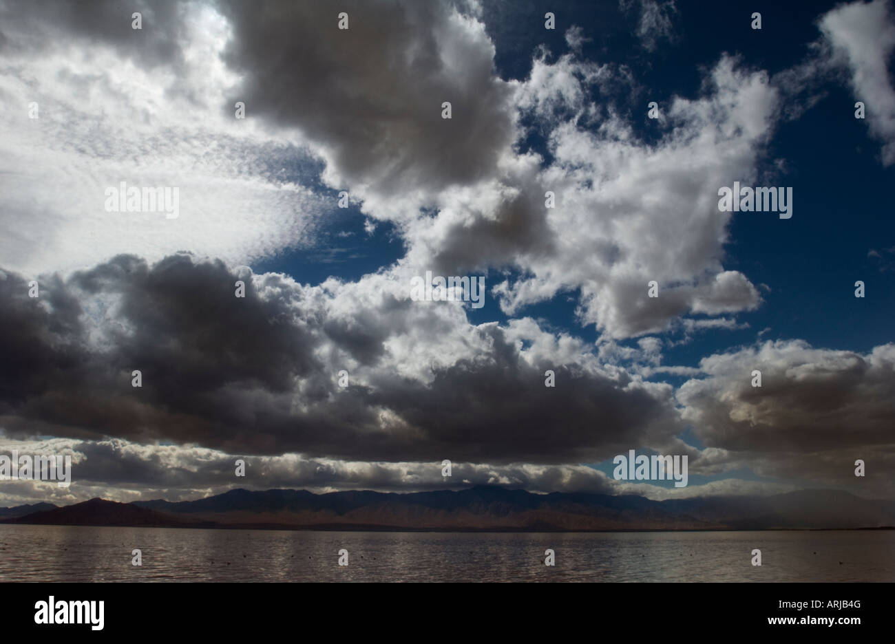 Picturesque sea of high noon Clouds in a blue Sky with cool colors in a ...