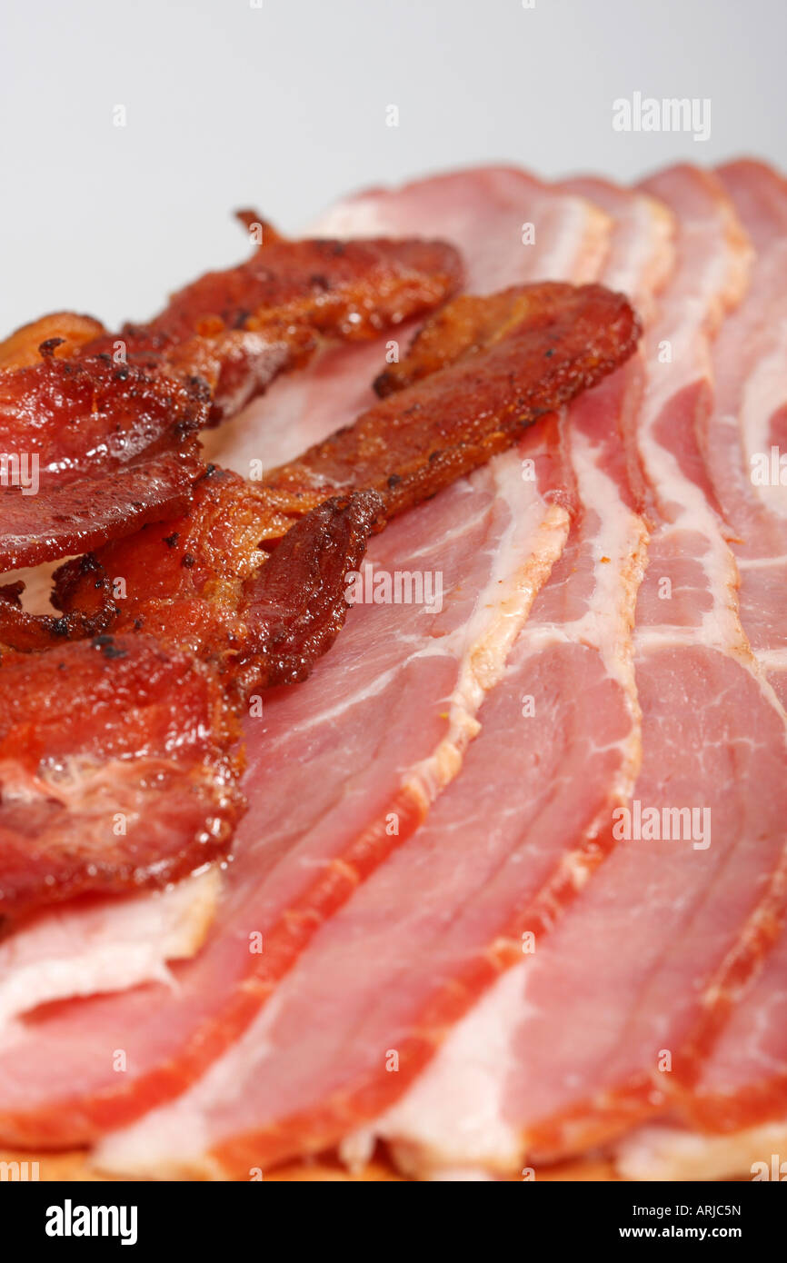 Bacon raw with crispy strips pork bacon meat fat food photo of a back ...