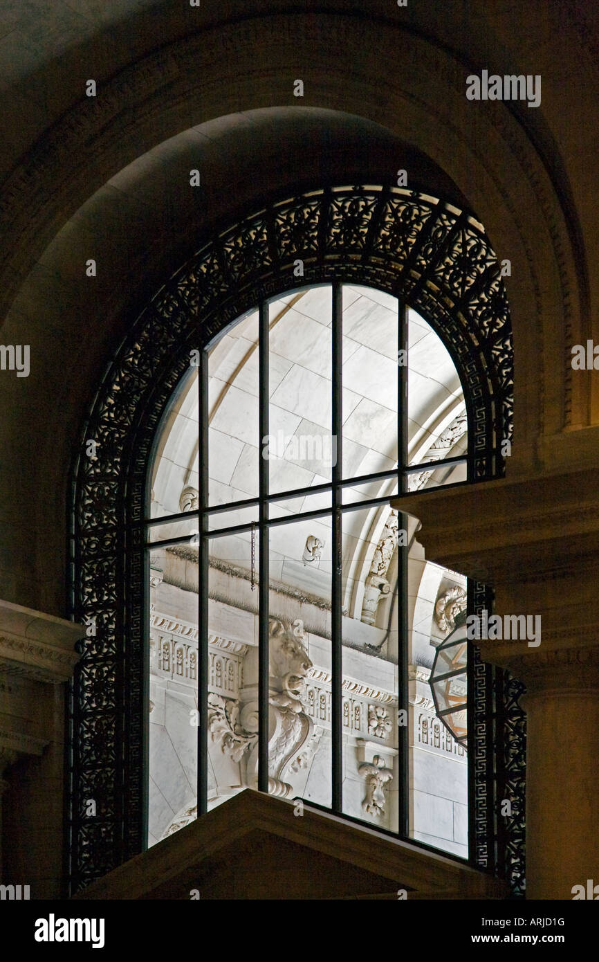 ARCHED Window and stone lion carving NEW YORK CITY PUBLIC LIBRARY Stock ...