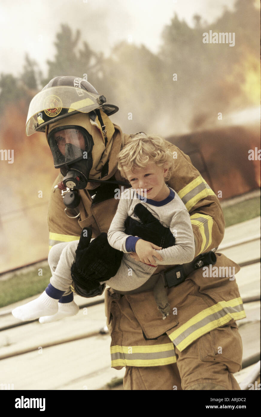 Firefighter Carrying Baby