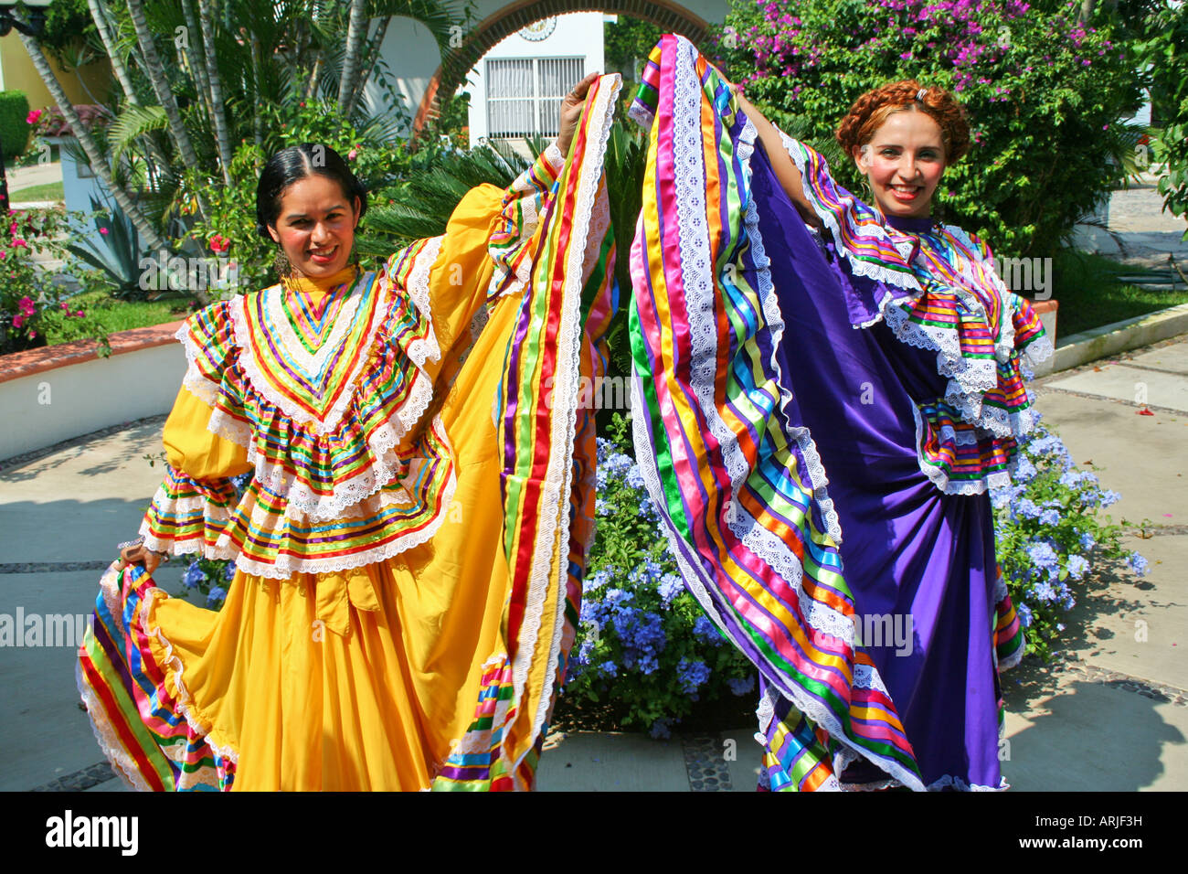 Pretty latin woman with tradition dance clothing Stock Photo - Alamy
