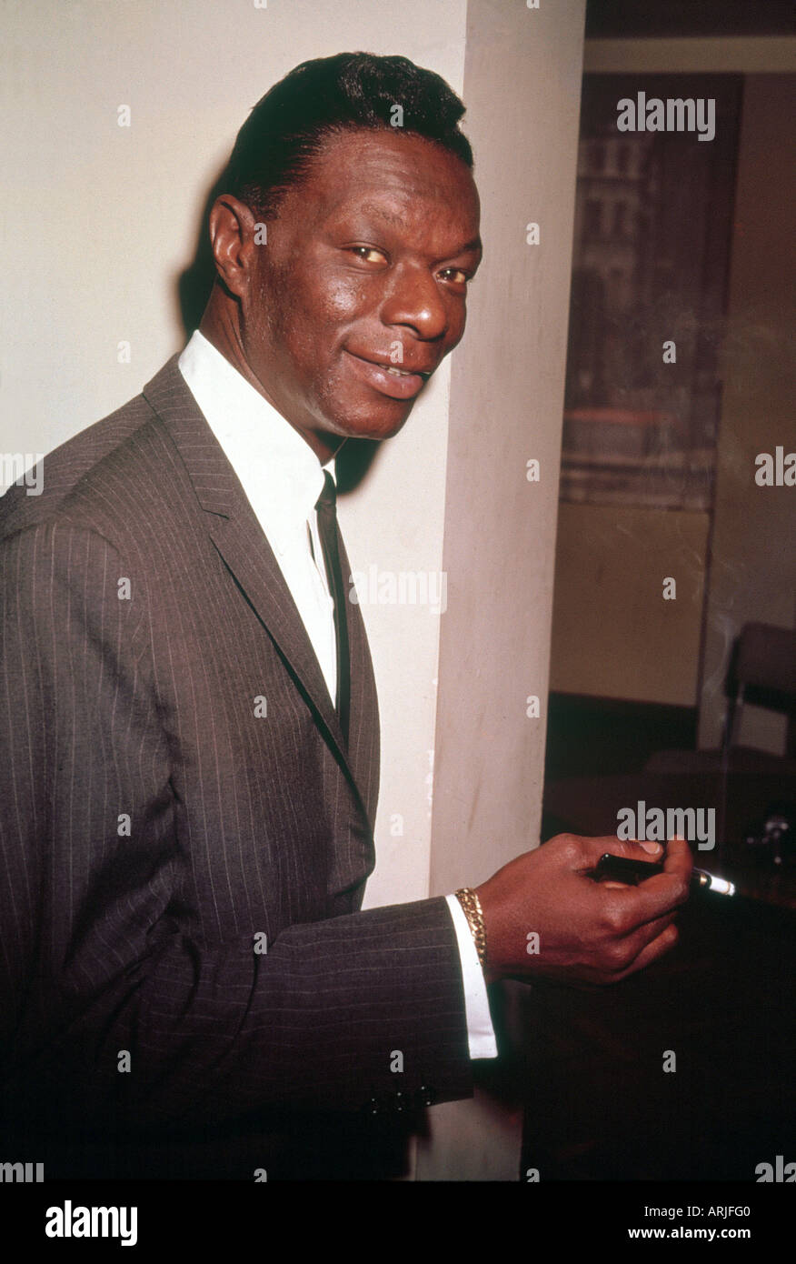 NAT KING COLE (1919-1965) American singer in 1964. Photo Tony Gale ...