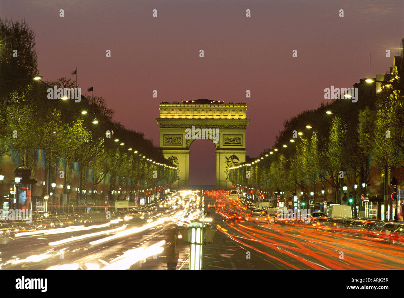 Avenue des Champs Elysees and the Arc de Triomphe at night, Paris ...