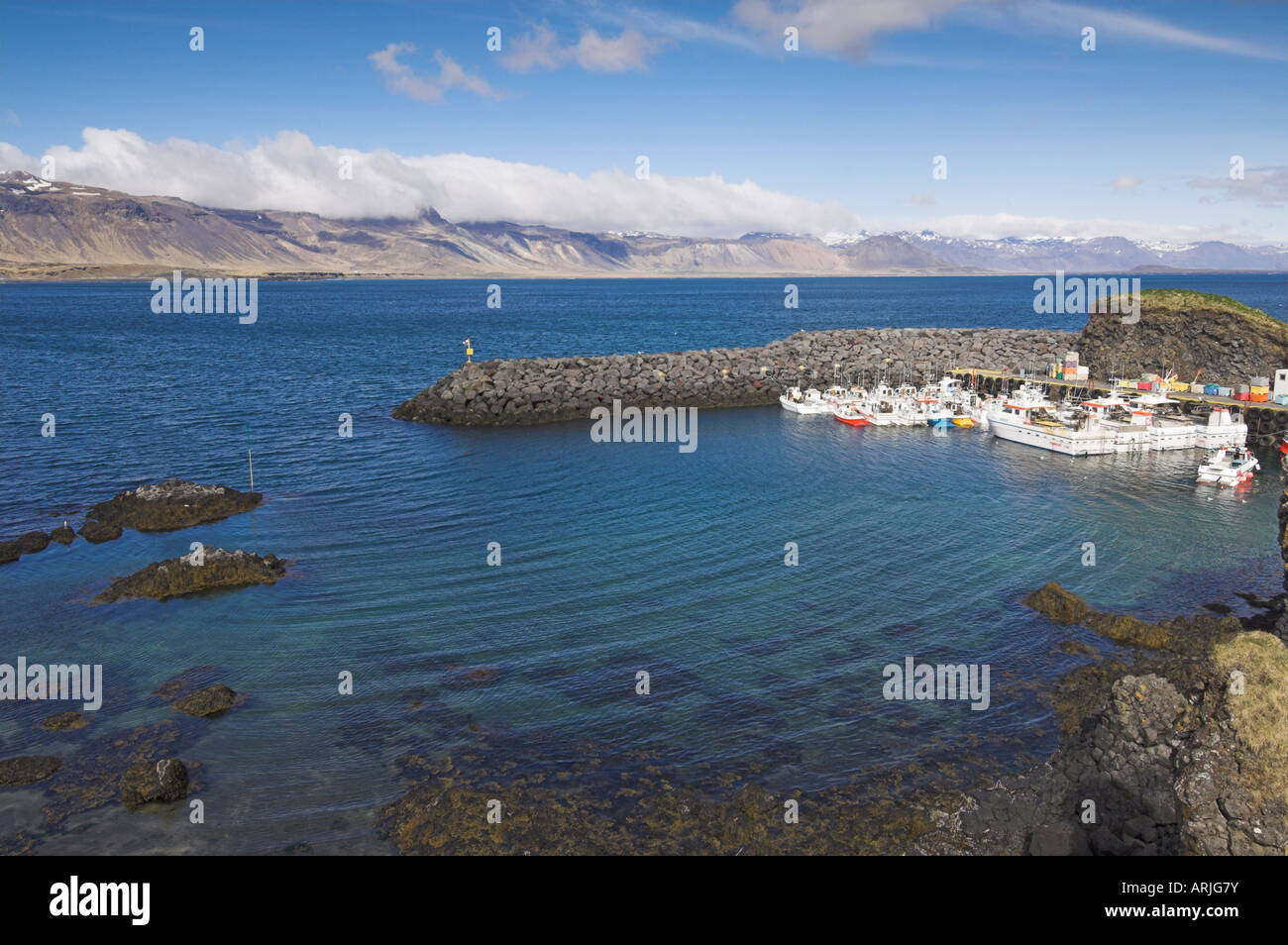 Small fishing boats and trawlers in Arnarstapi harbour, Snaefellsnes ...