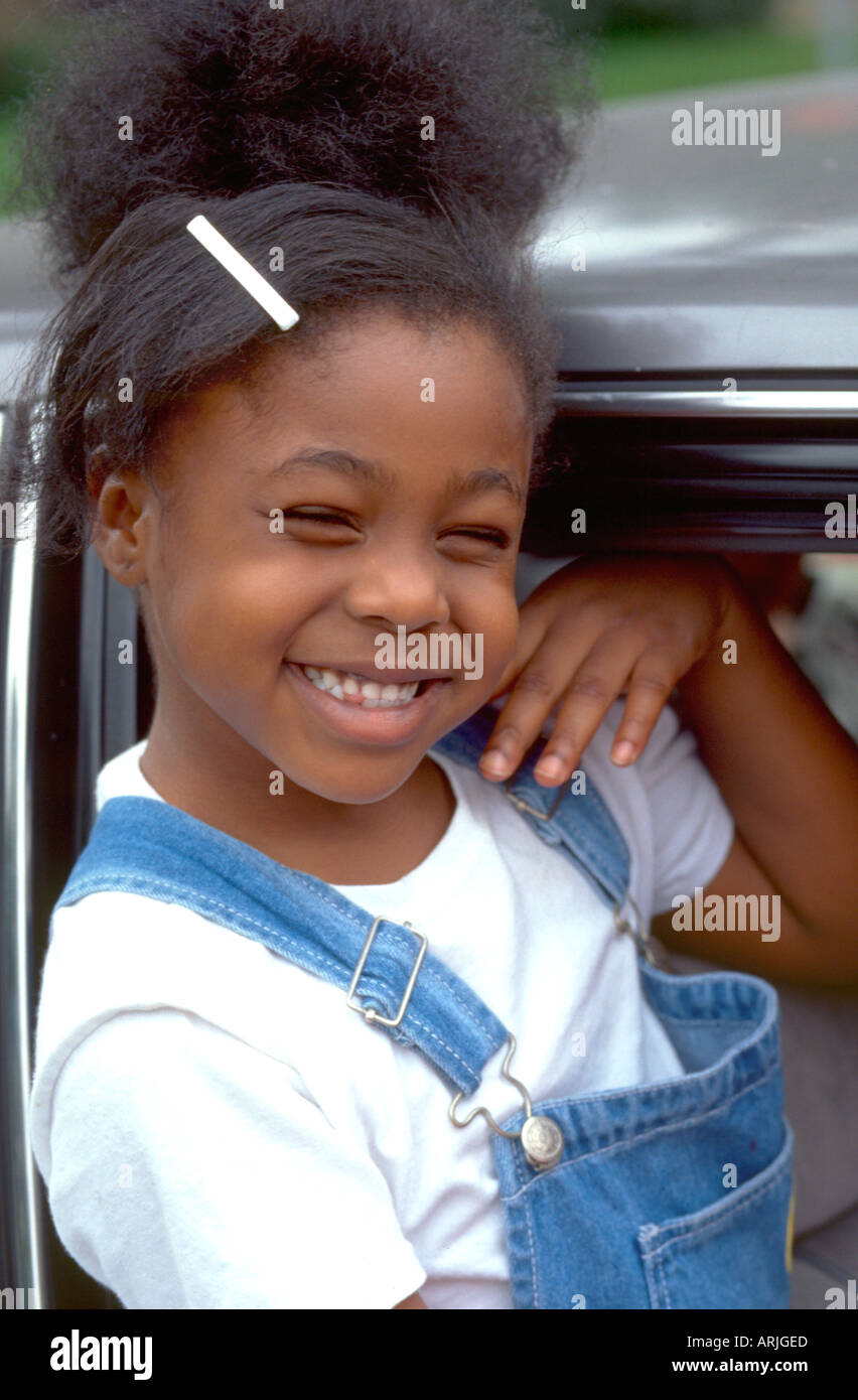 Black girl age 5 with a big grin on face at West End Festival. St Paul ...