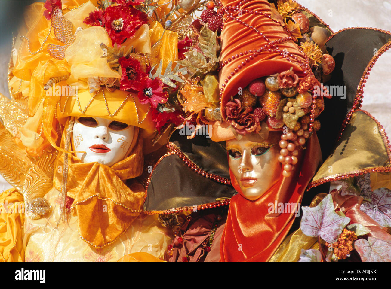 People wearing masked carnival costumes, Venice Carnival, Venice ...