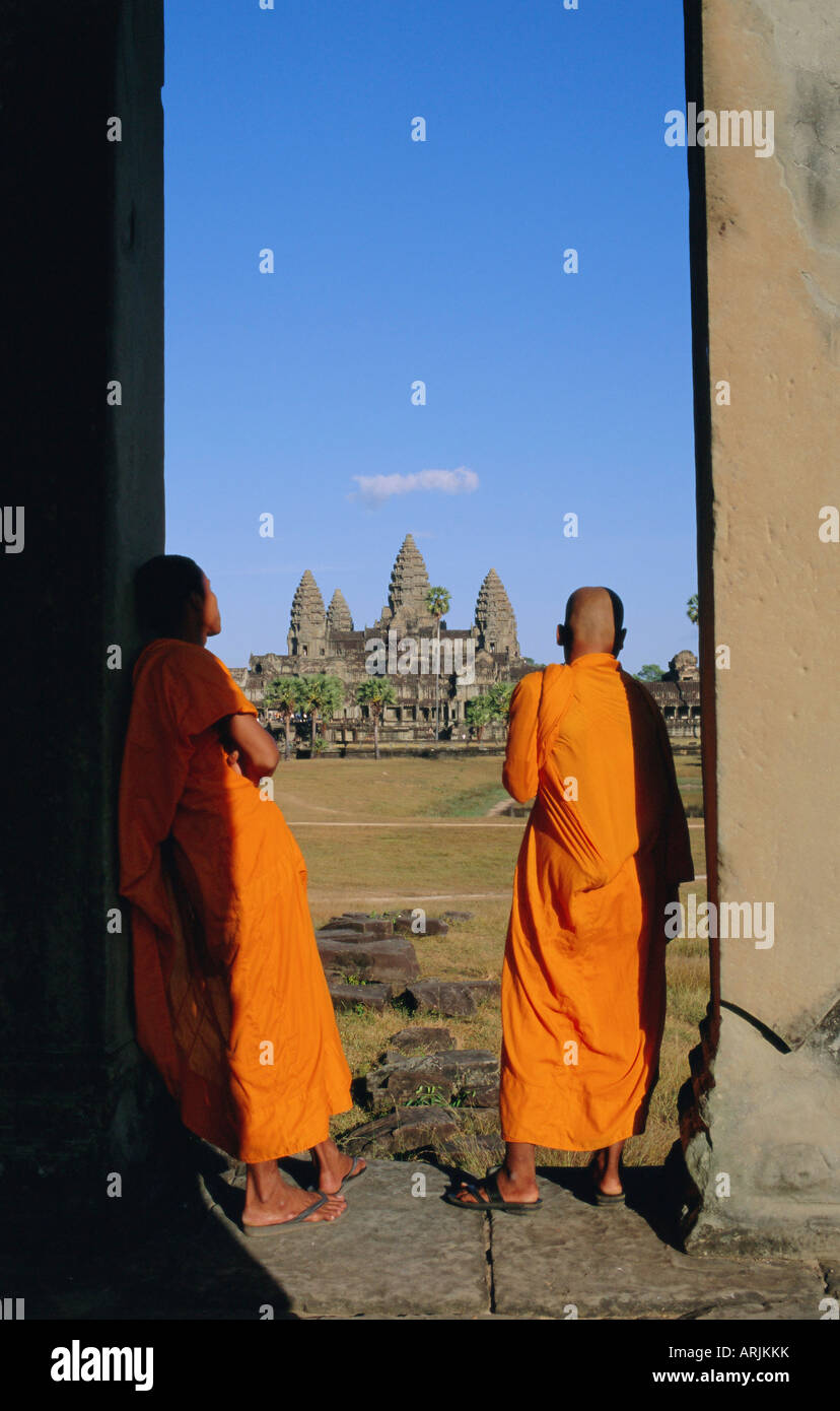 Buddhist monks at the temple complex of Angkor Wat, Angkor, Siem Reap ...
