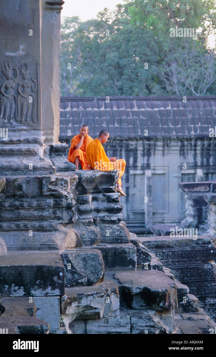 Buddhist monks at the temple complex of Angkor Wat, Angkor, Siem Reap ...