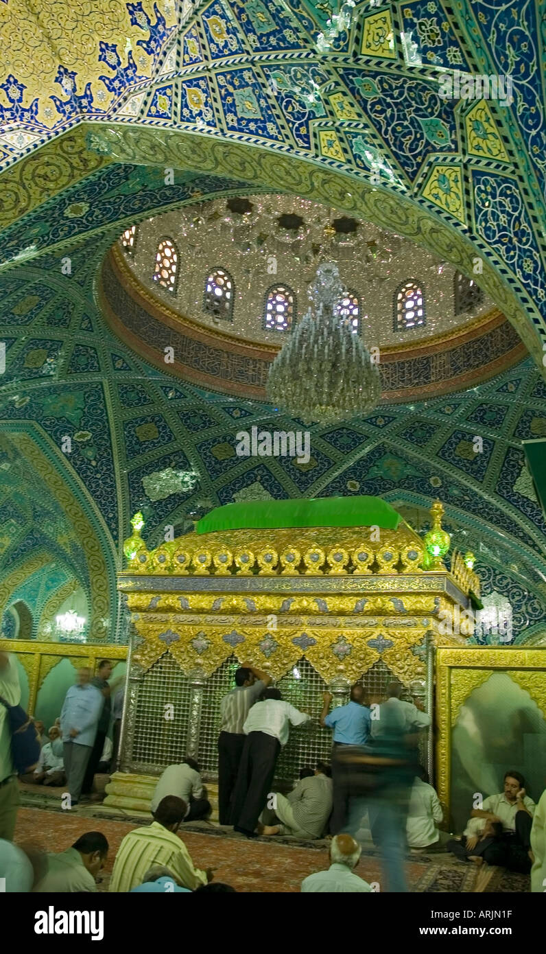 Pilgrims at prayer inside the very gaudy and garish Interior of Sayyida ...