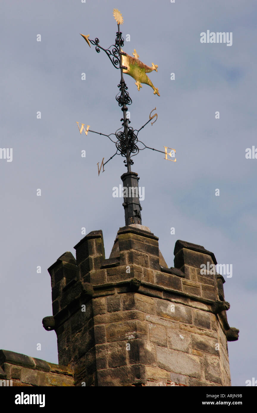 Sandstone tower with weather vane pointing to the West Stock Photo - Alamy