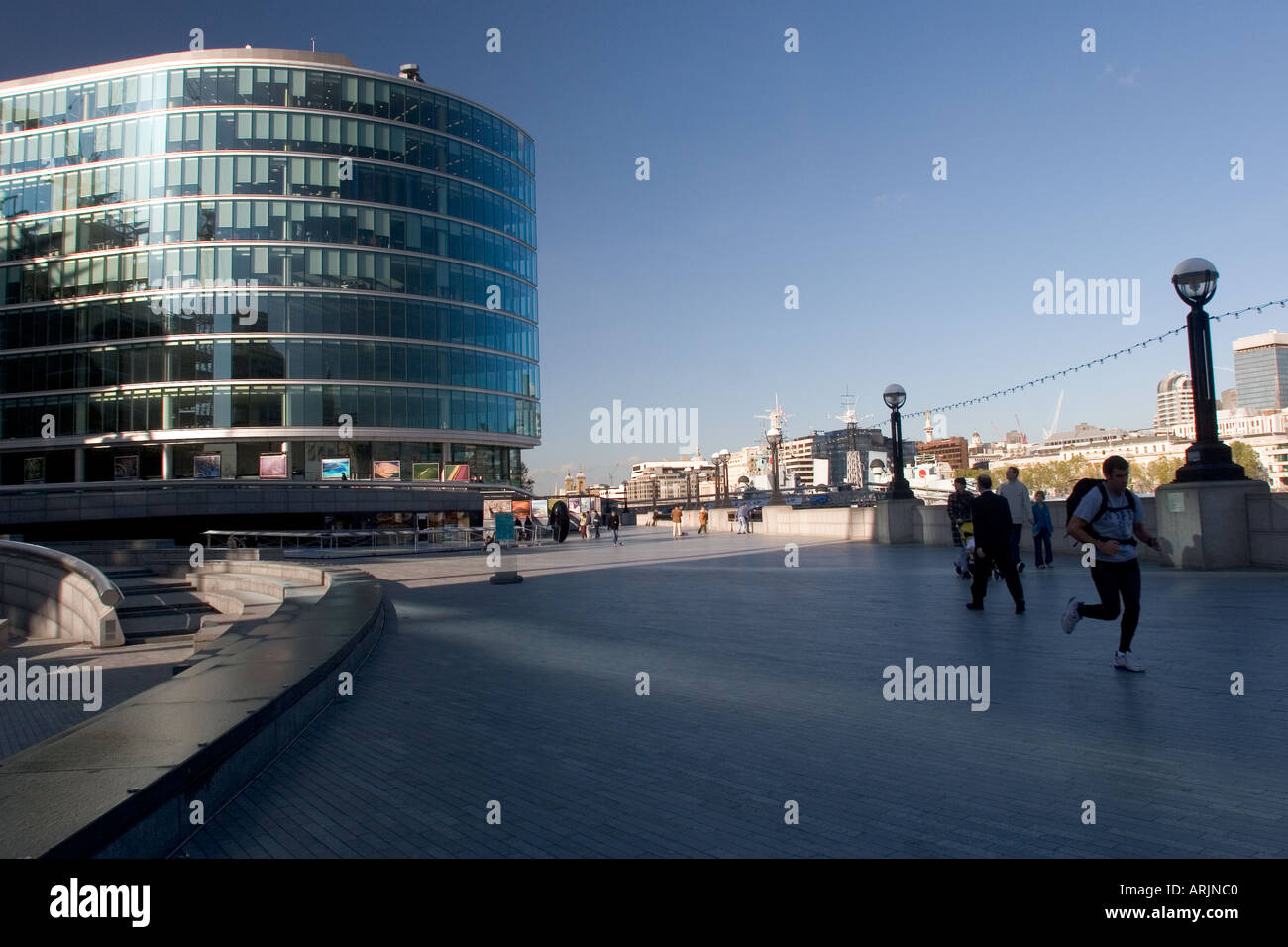 Modern office building and walkway next to City Hall Southwark London ...