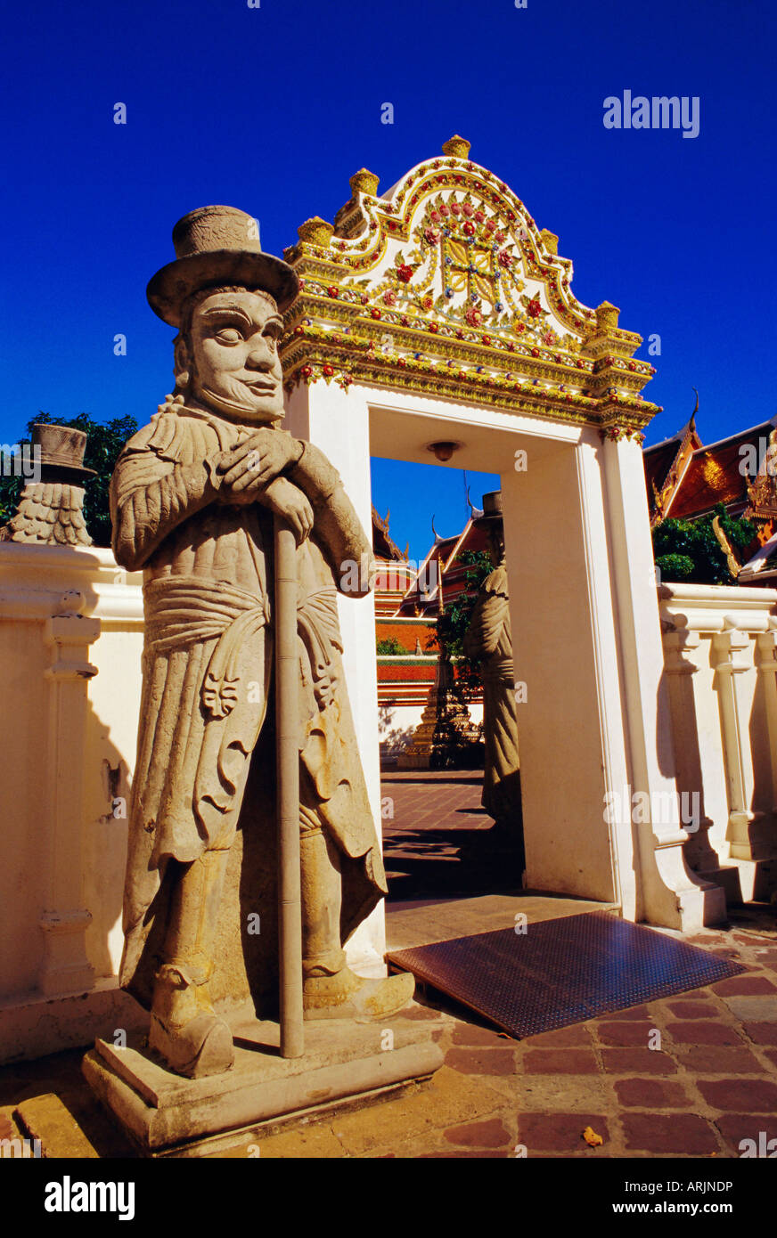 Giant stone statue of Farang Guard, Wat Pho, Bangkok, Thailand Stock ...