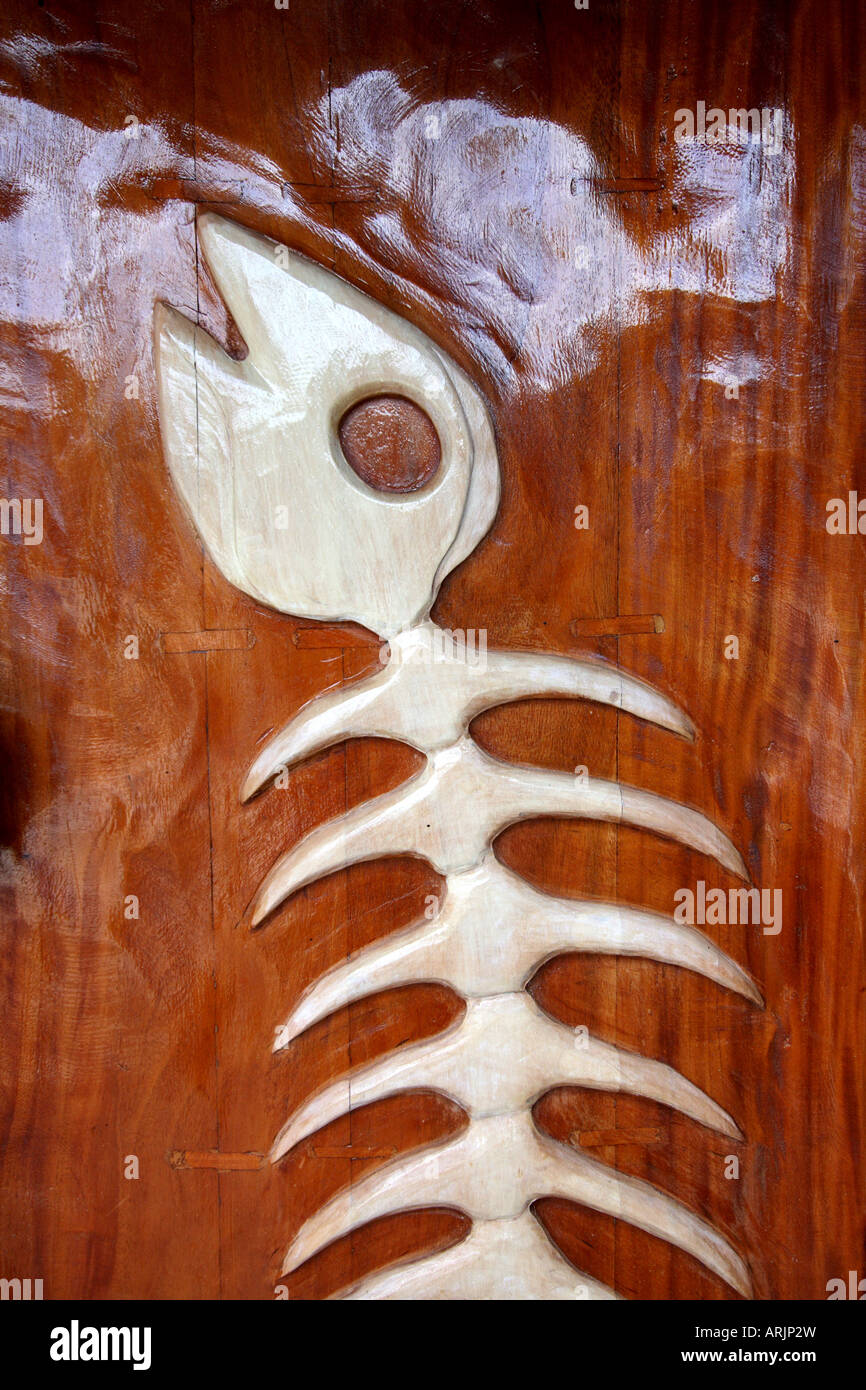 CARVING OF FISH SKELETON ON WOODEN DOOR VERTICAL BDB11397 Stock Photo ...