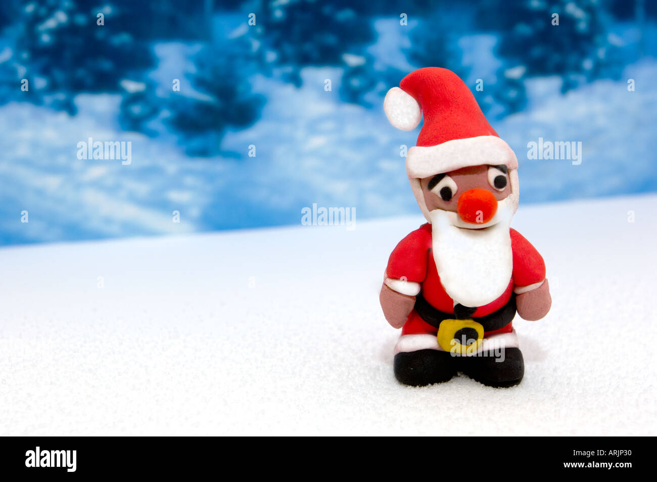 Plasticine childs models of Santa Clause or Father Christmas in a ...