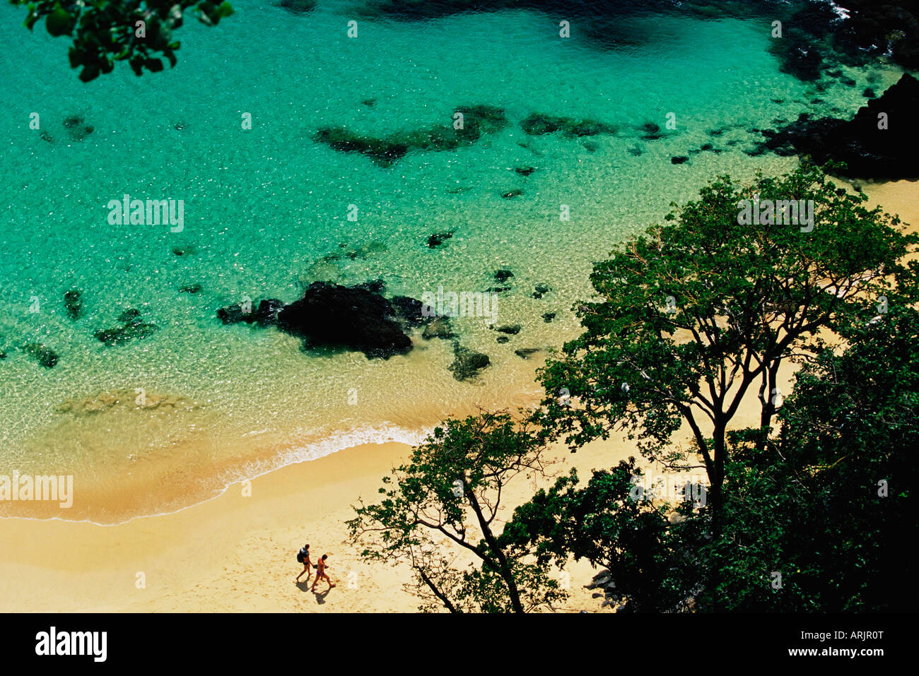 People walking on Baia do Sancho beach, Parque Nacional de Fernando de ...