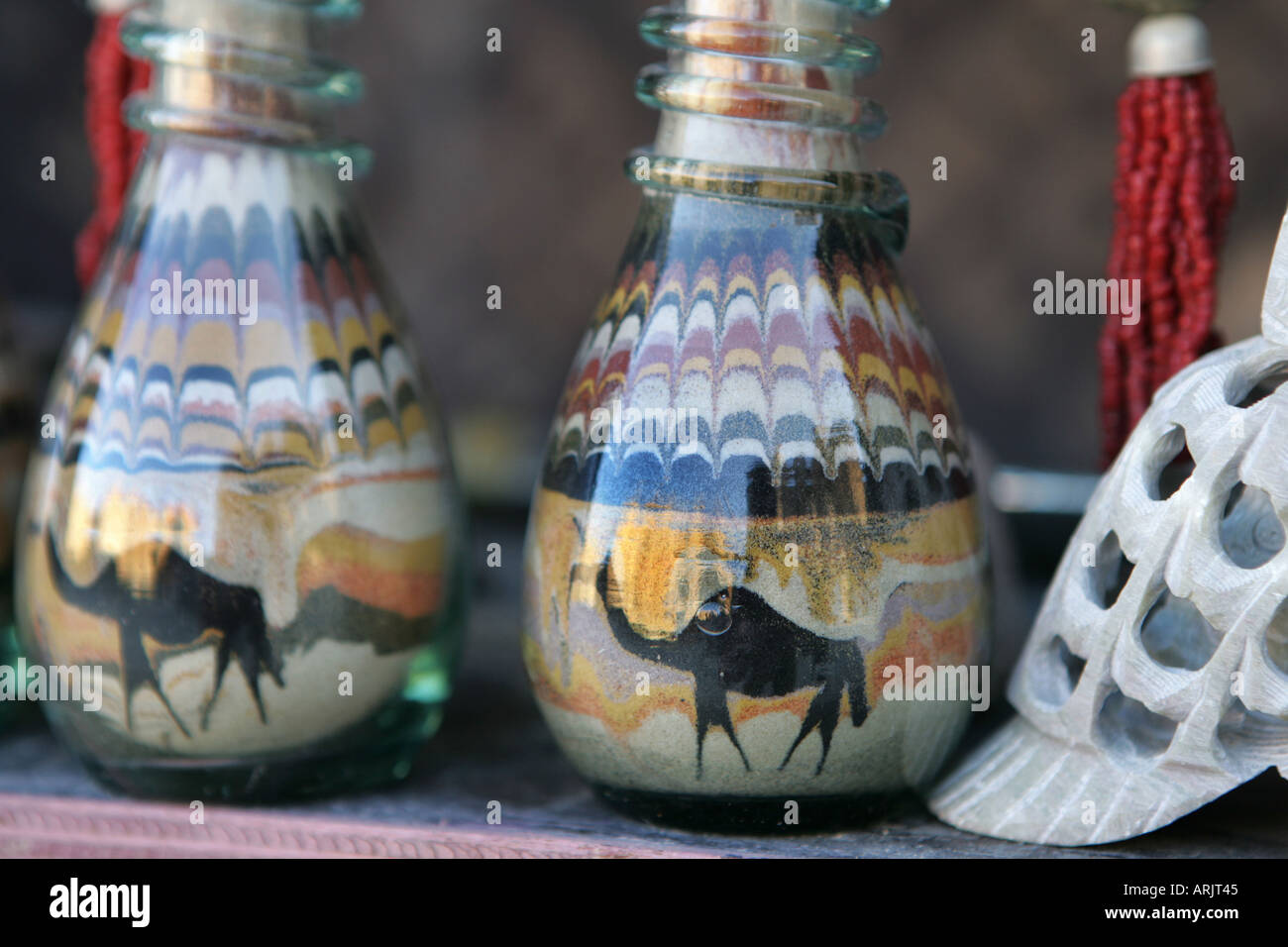 JOR, Jordan, Petra: Coloured sand vases. Souvenir shop in the Nabatean ...
