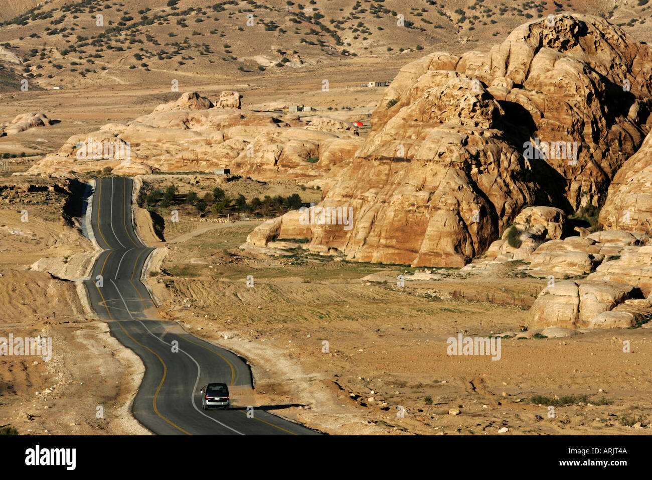 JOR, Jordan, Petra: Country road from the Desert Highway to the city of ...