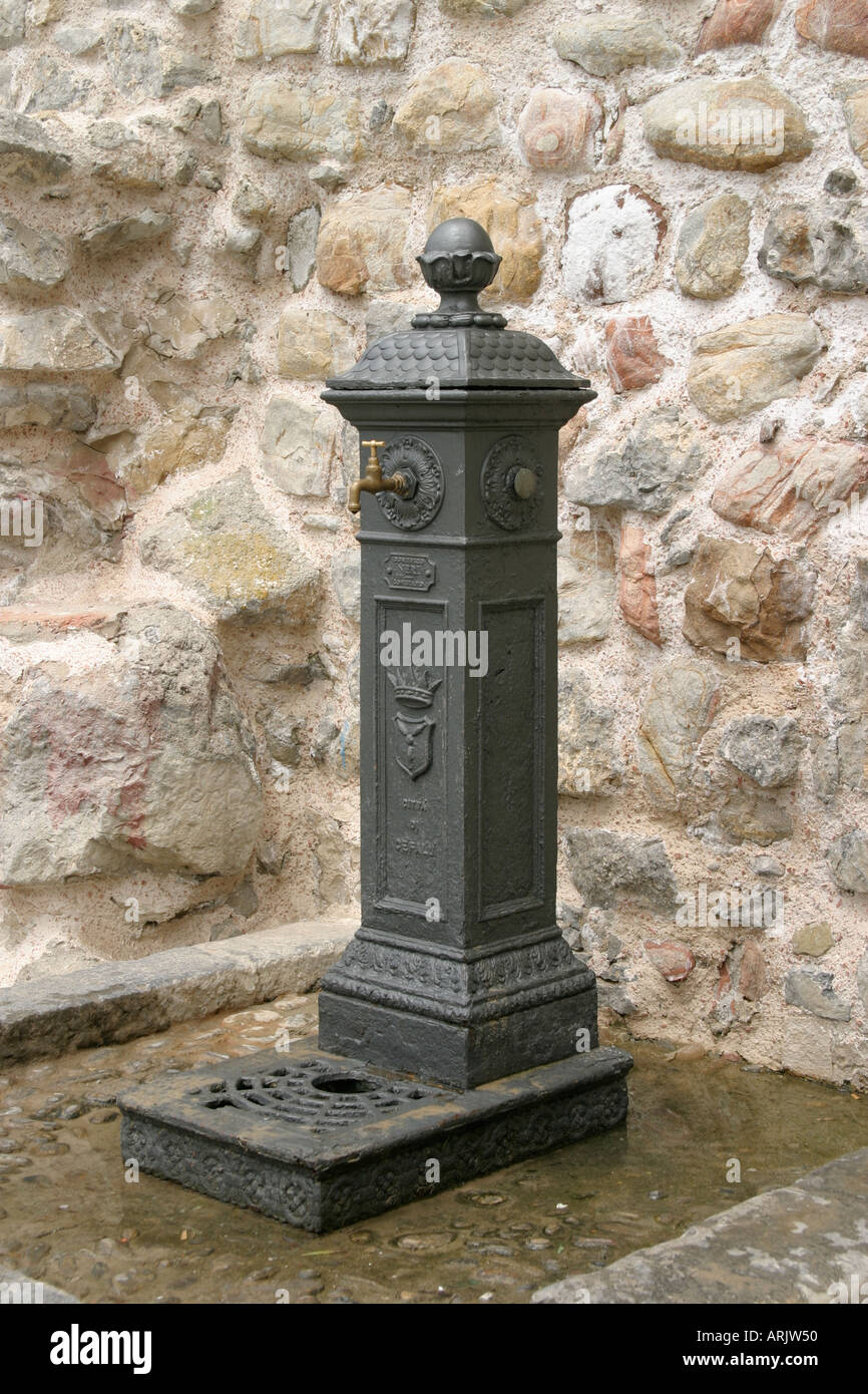 Communal water tap Cefalu harbour Stock Photo - Alamy