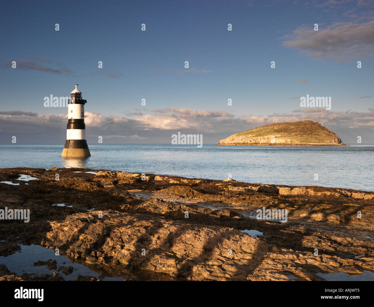 Anglesey Lighthouse and Puffin Island at Sunset, Wales, Summer, 2006 ...