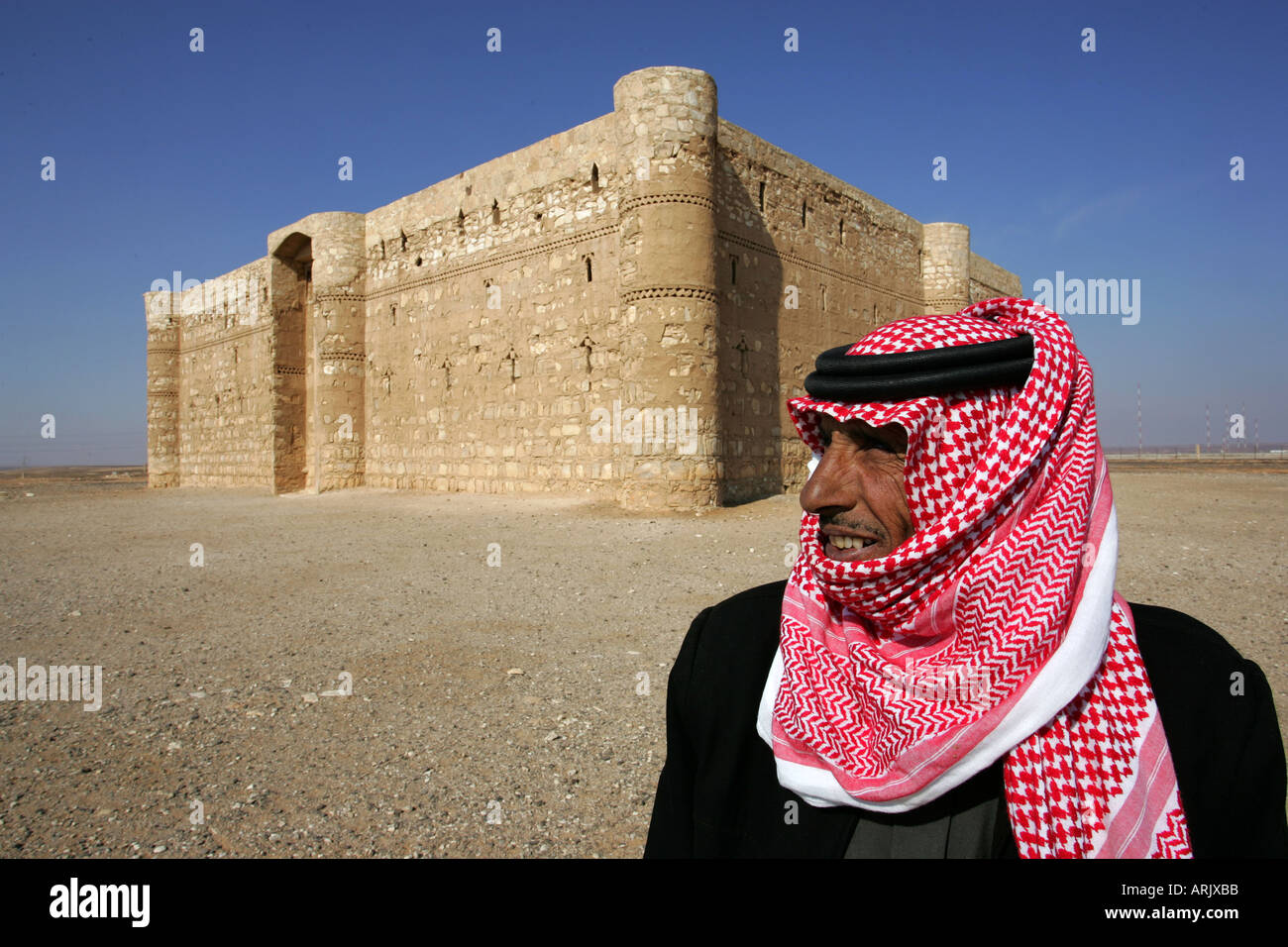 JOR, Jordan : Guard man of the desert Castle Qasr al-Kharana ...