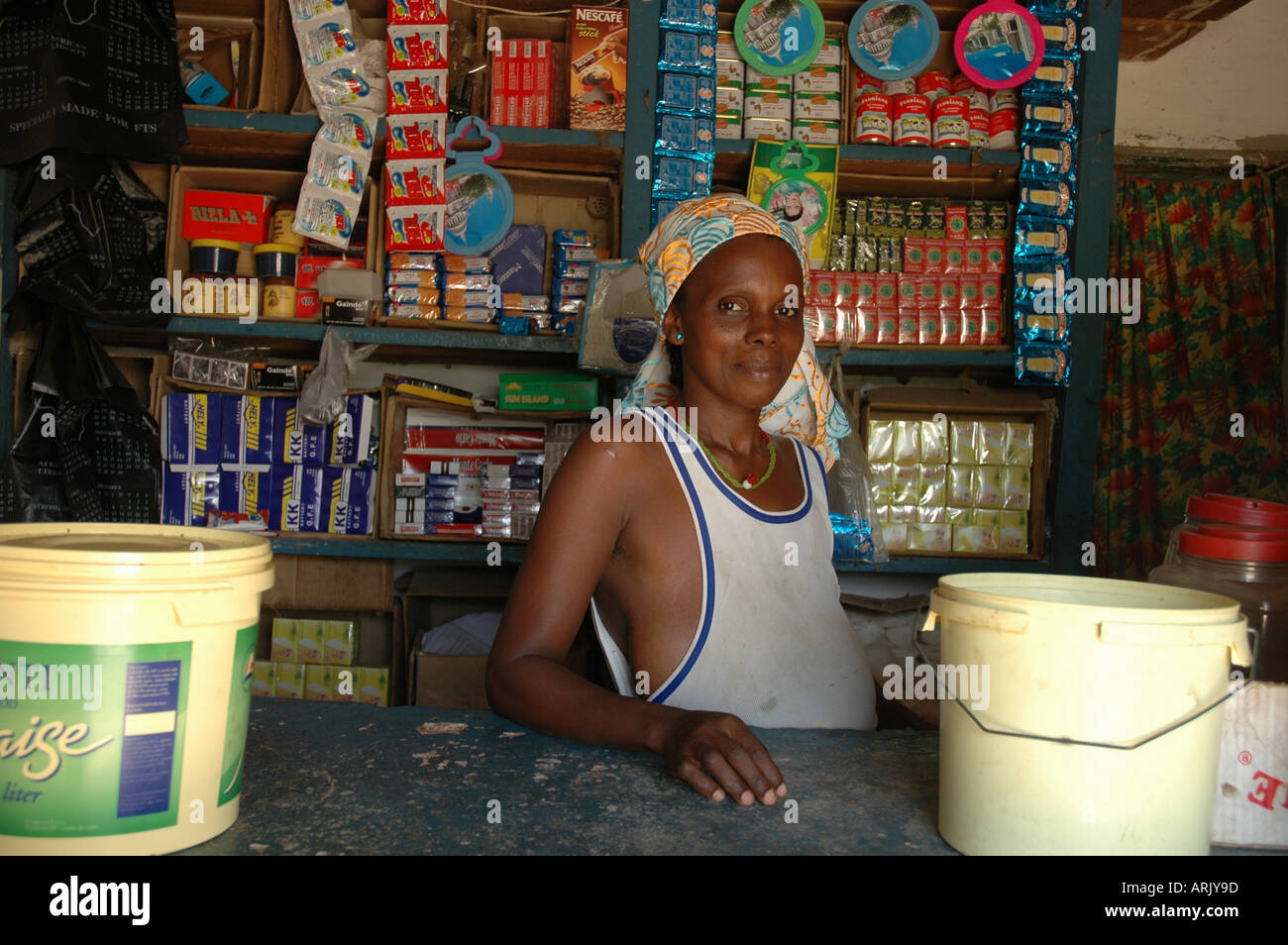 Shopkeeper and her stock. Jangjangburreh The Gambia West Africa Stock ...