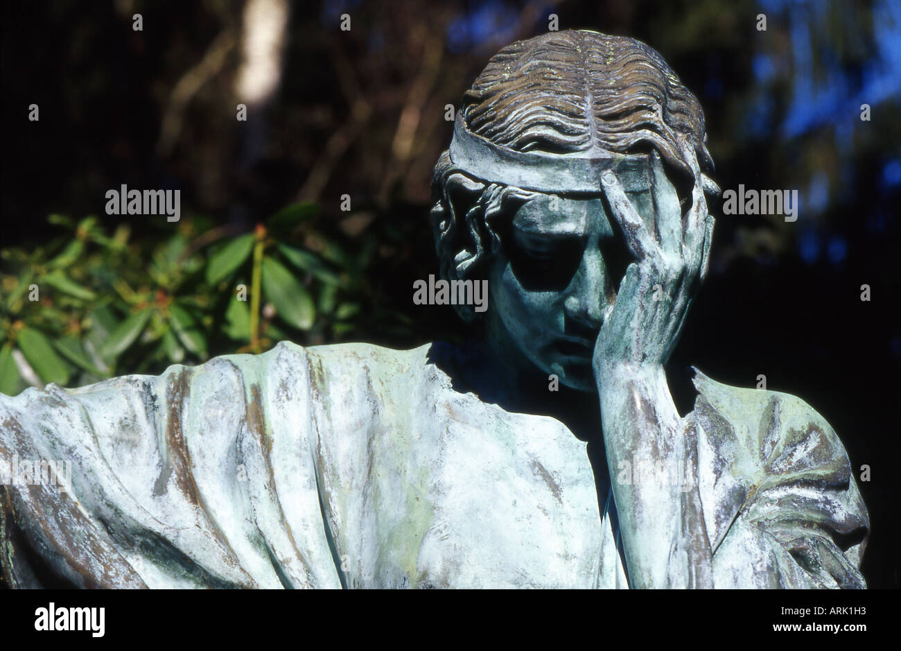 Mourning statue on the graveyard of Ohlsdorf in Hamburg, Germany Stock ...