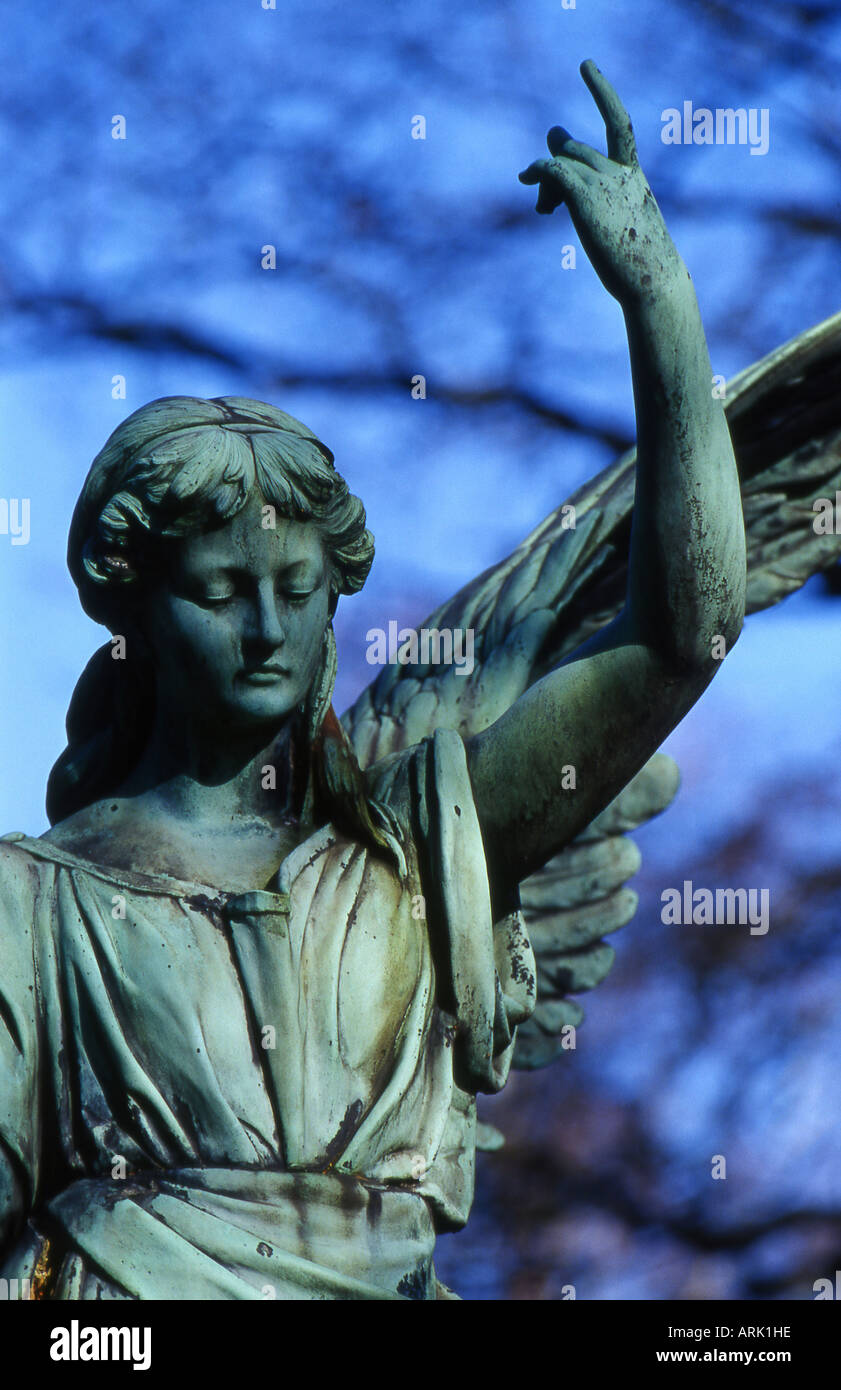 Statue of an angel on the graveyard of Ohlsdorf in Hamburg, Germany ...