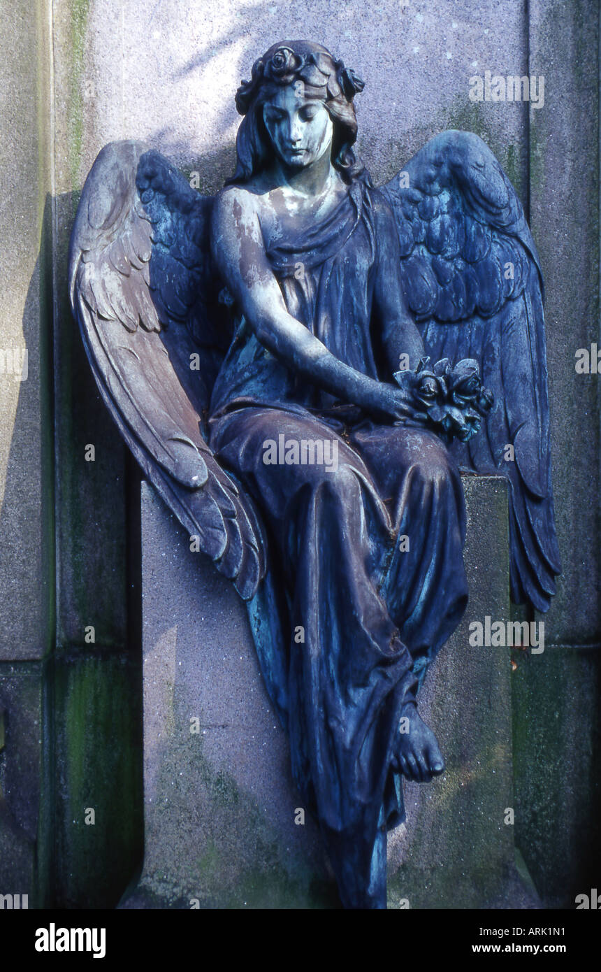 Statue of an angel on the park cemetery Ohlsdorf, Hamburg, Germany ...