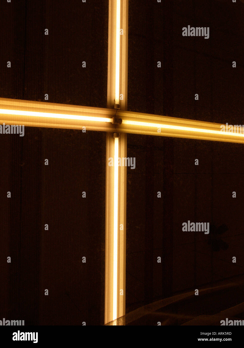 crossed yellow neon lights Stock Photo - Alamy