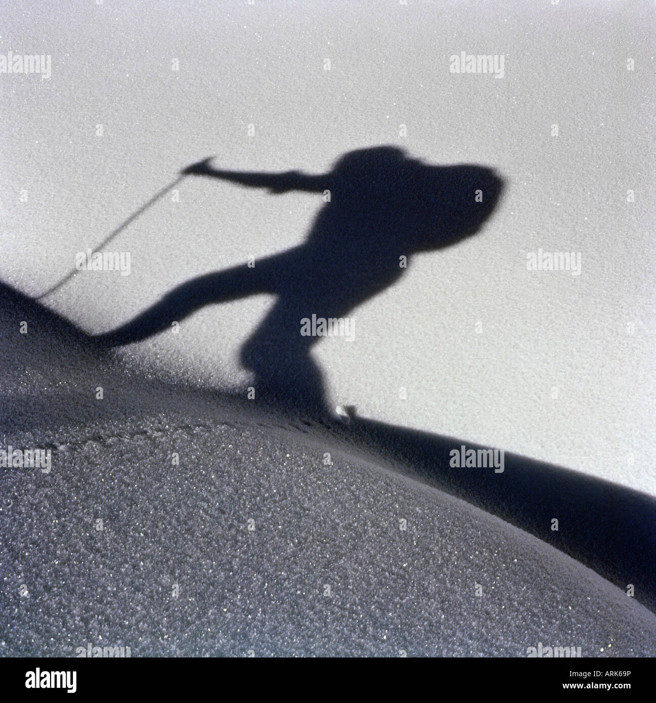 Shadow of a skier on a ski slope Stock Photo - Alamy